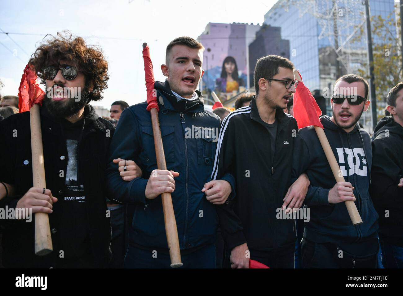 Protesters march during the 14th anniversary of the 2008 fatal police ...