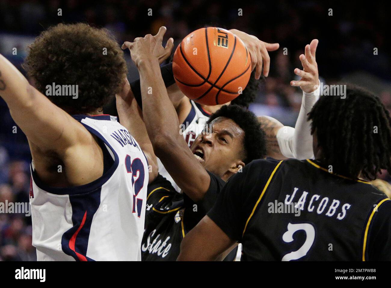Kent State forward Miryne Thomas, center, goes after a rebound near ...