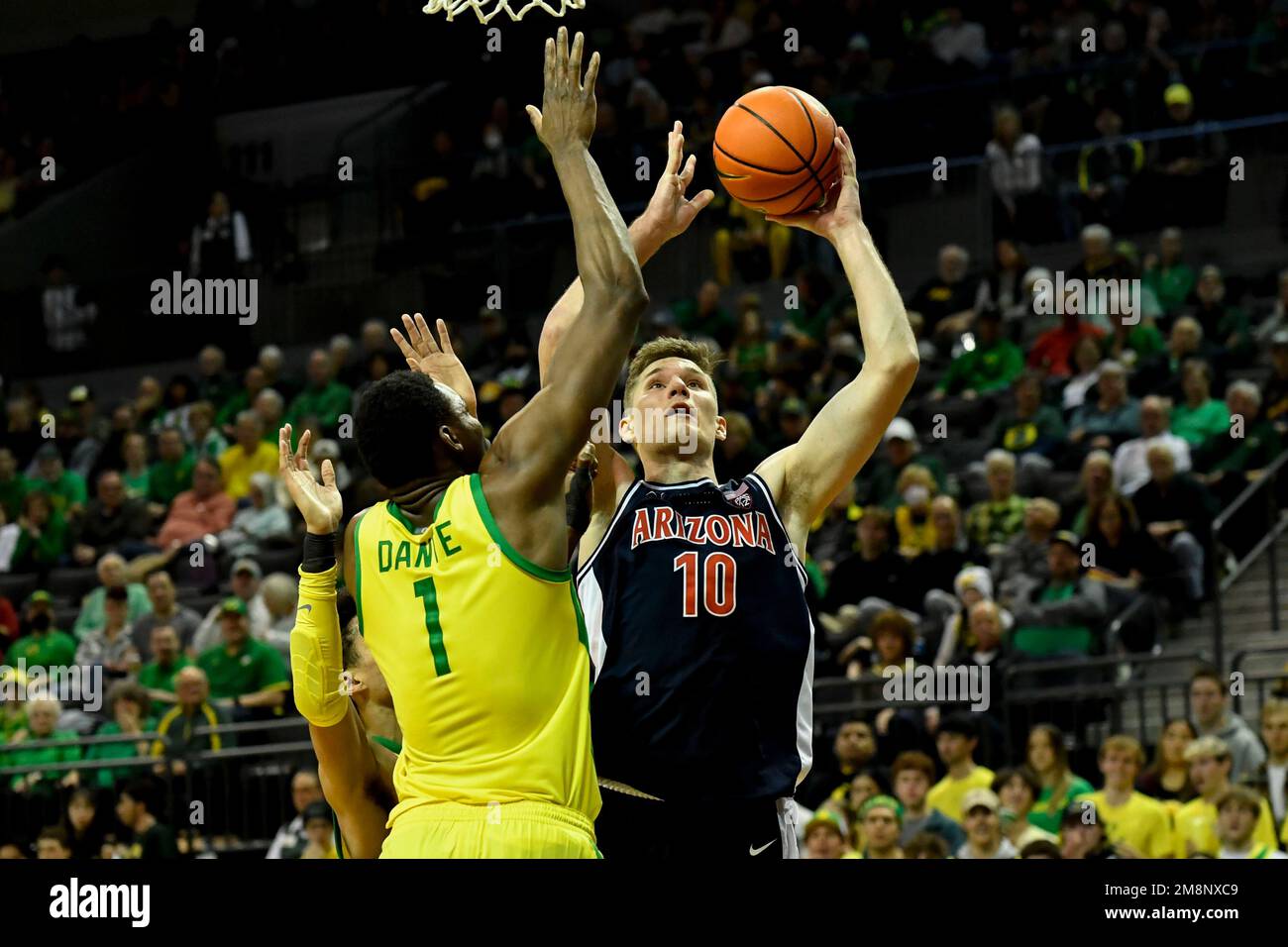 Arizona forward Azuolas Tubelis (10) shoots over Oregon center N'Faly ...