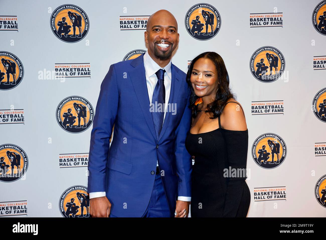 Former Connecticut great, Richard Hamilton, left, and his wife T.J. Lottie pose for photos after ...