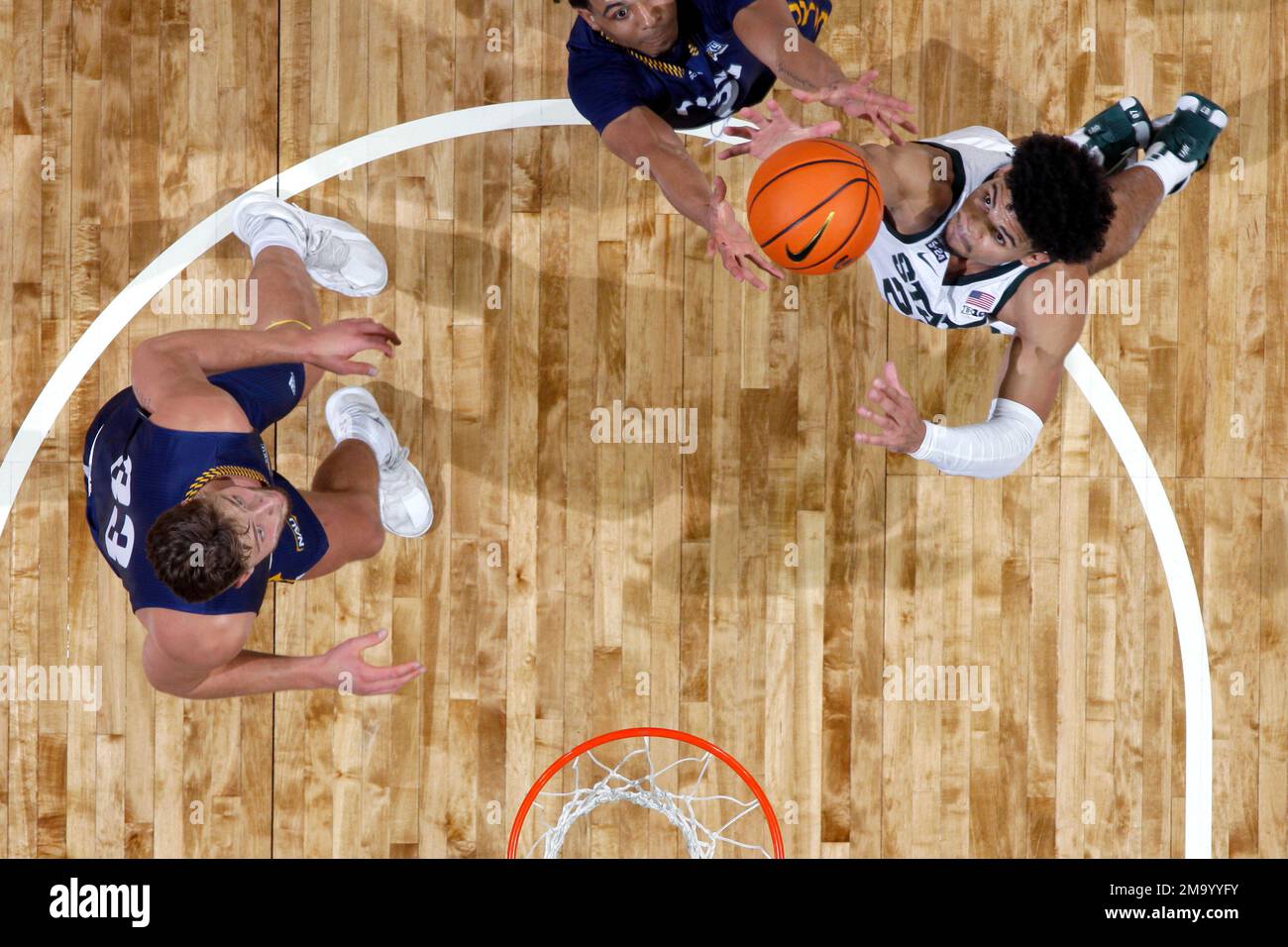 Michigan State's Malik Hall, right, and Northern Arizona's Xavier ...
