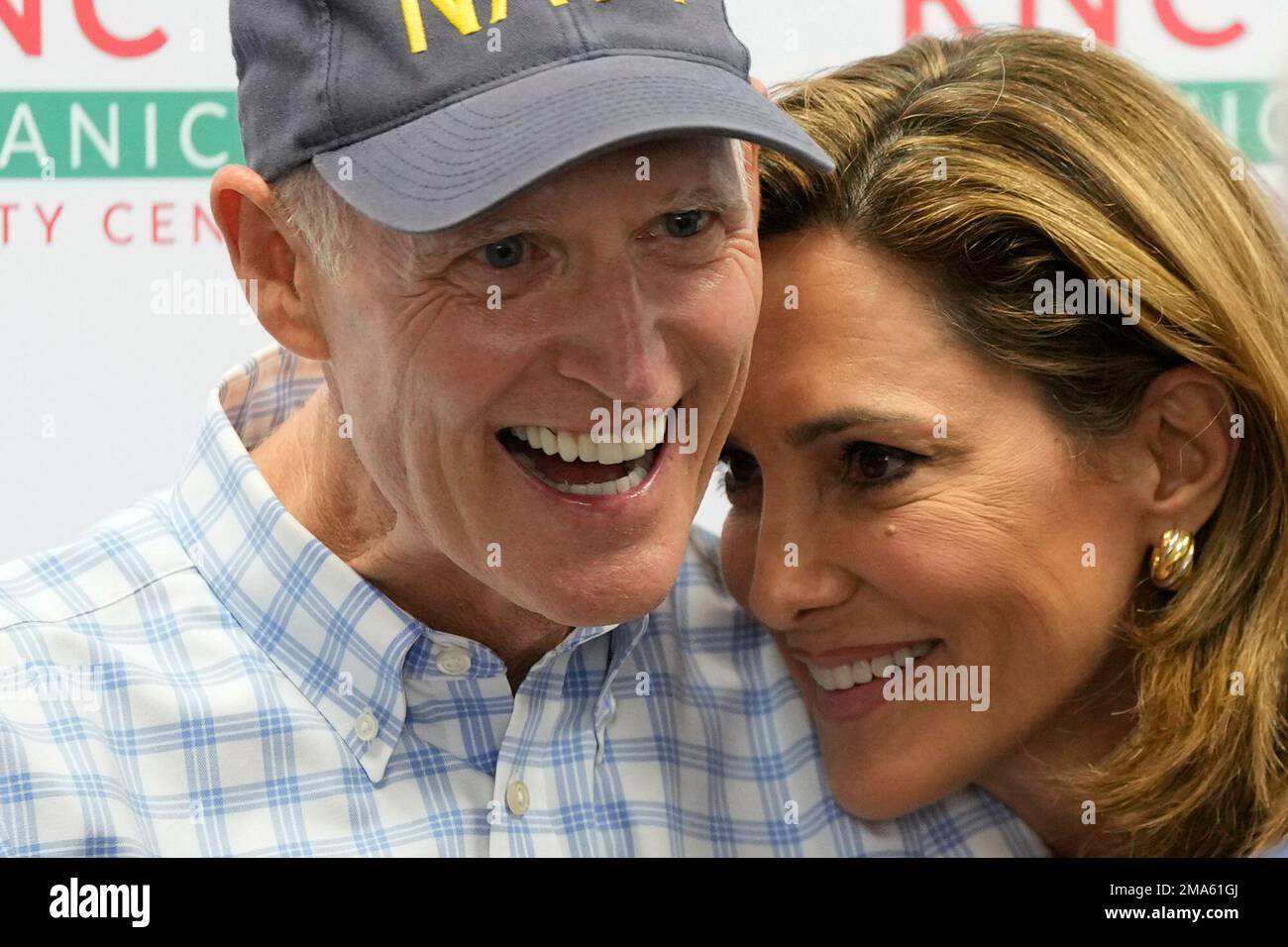 Rep. Maria Elvira Salazar, right, cuddles up to Sen. Rick Scott during ...