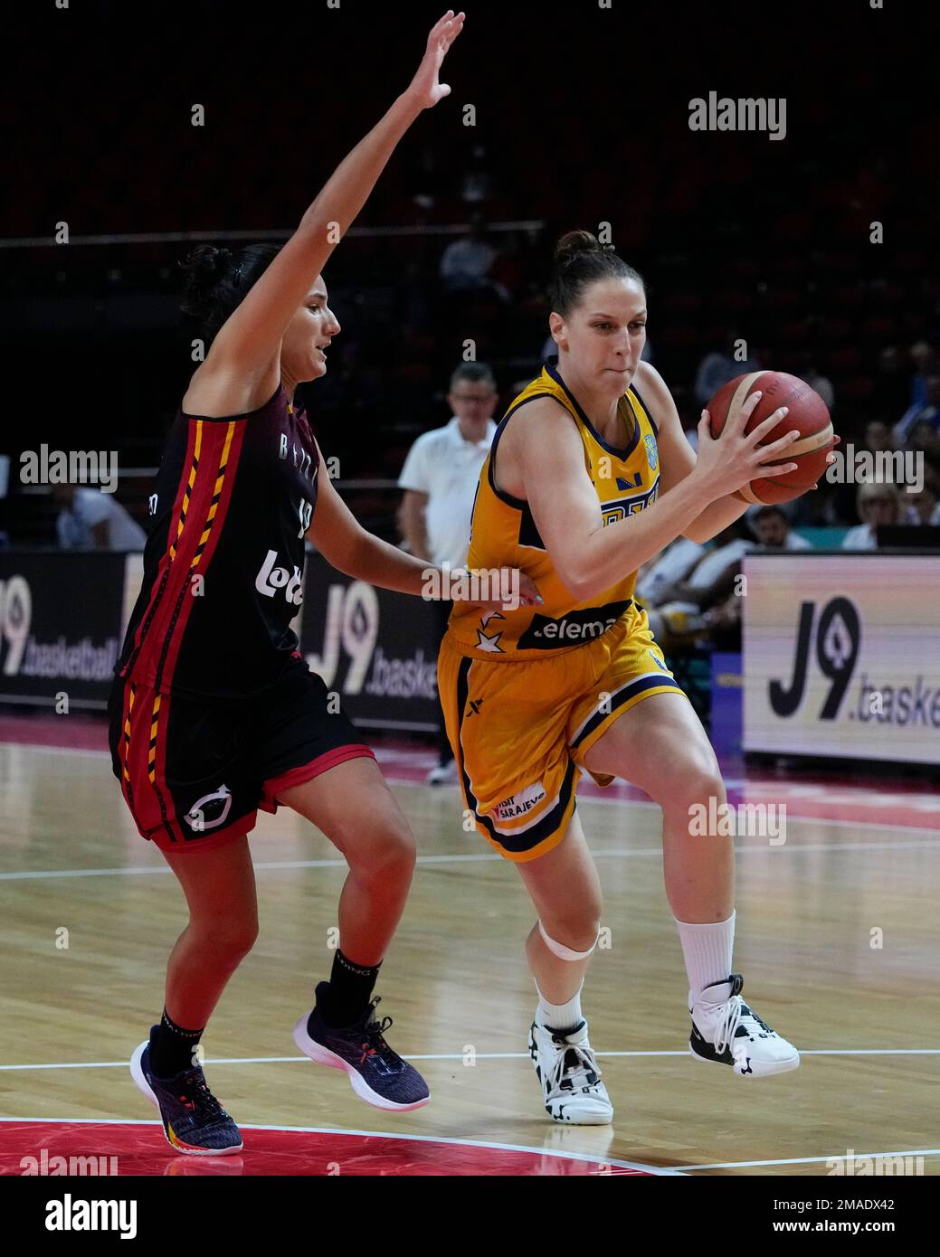 Belgium's Hind Ben Abdelkader, left, attempts to block Bosnia and ...