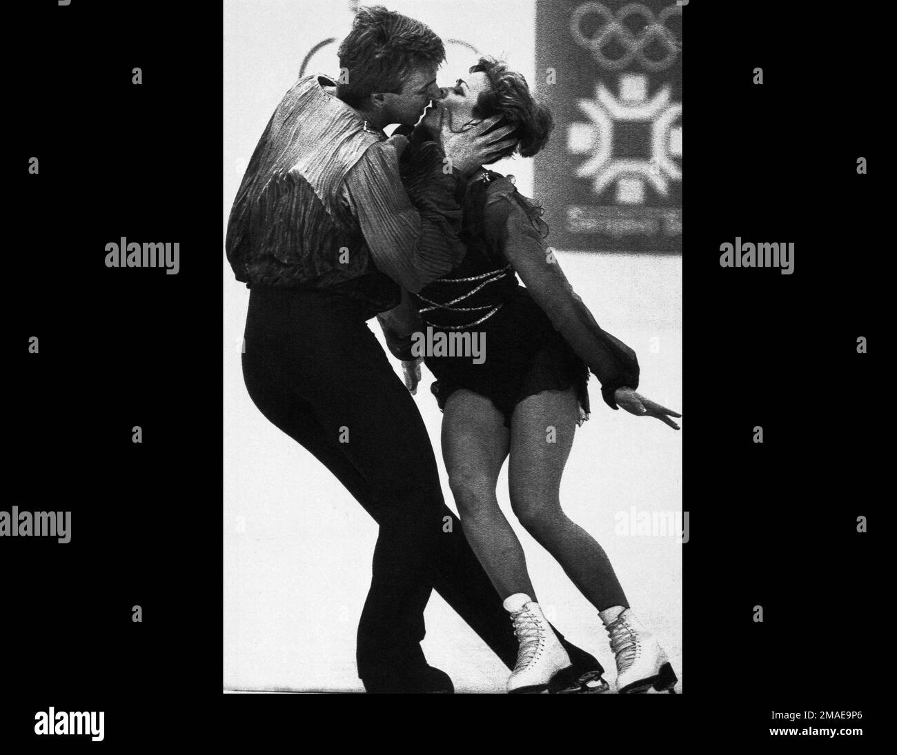 FILE - Britain's Jayne Torvill and Christopher Dean kiss during their ...
