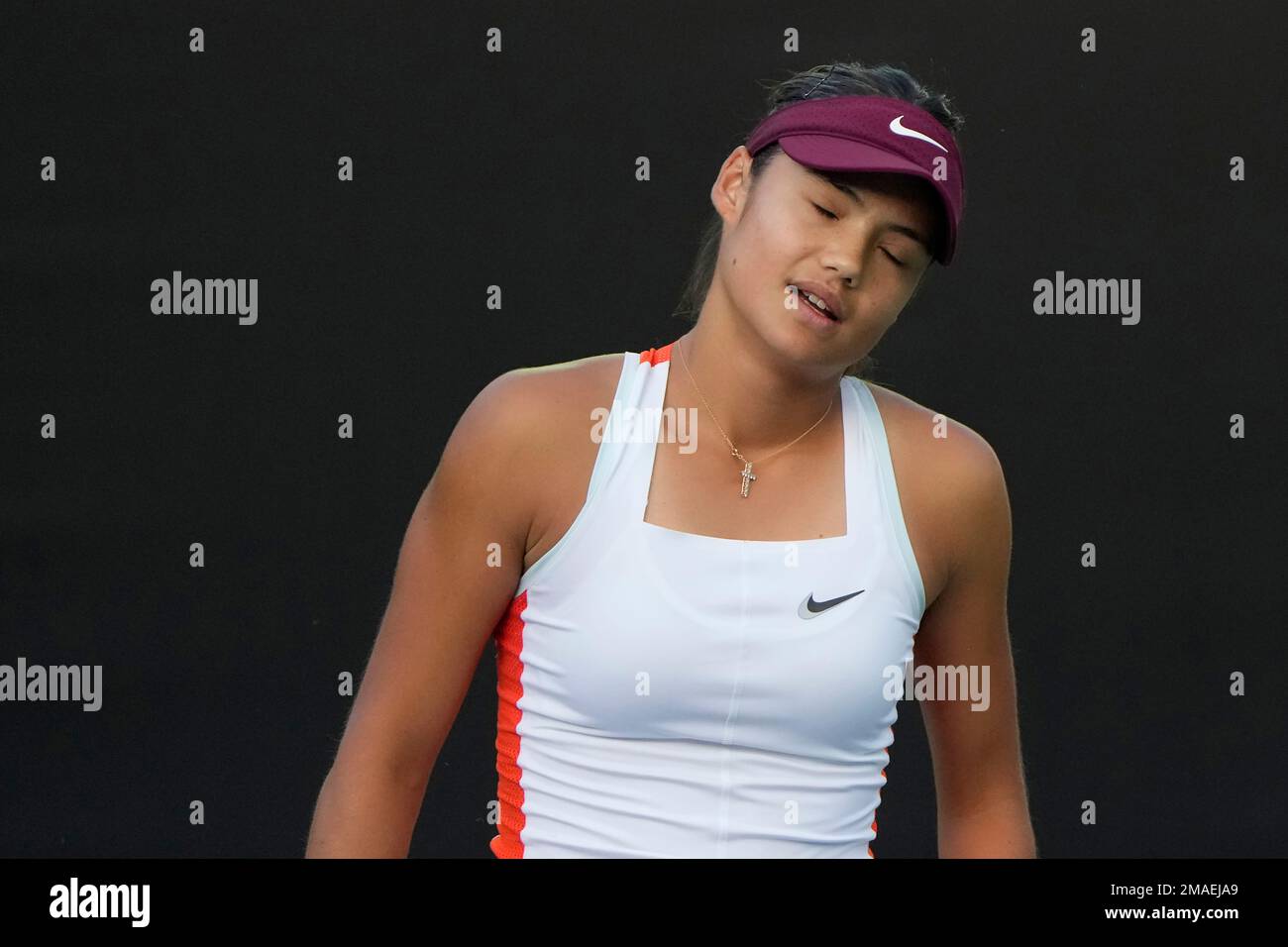 Emma Raducanu of Britain reacts after missing a shot against Jelena ...