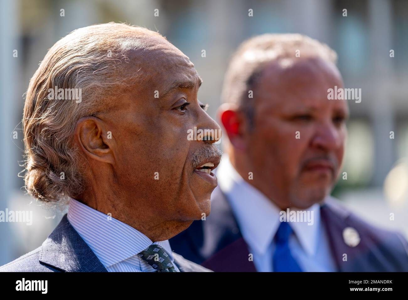 National Action Network Founder and President Rev. Al Sharpton, left, accompanied by National ...