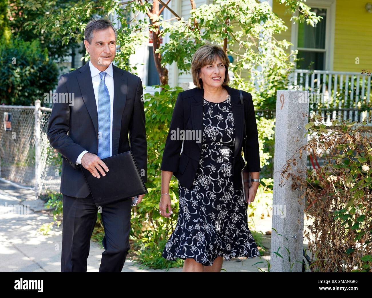 Dan Sideris and his wife, Carrie Sideris, of Newton, Mass., walk along ...