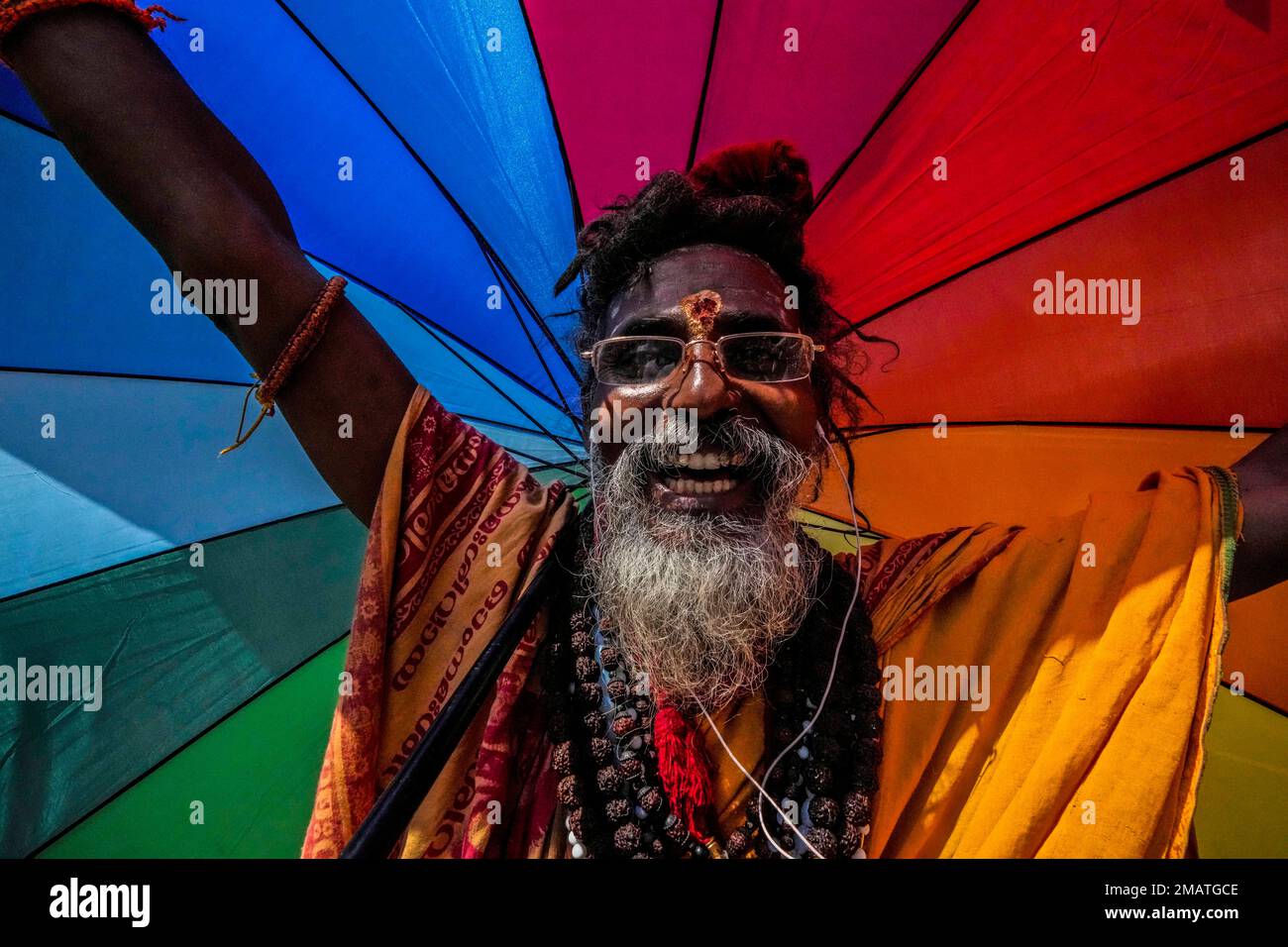 A Hindu holy man shouts religious slogans during a procession to mark ...