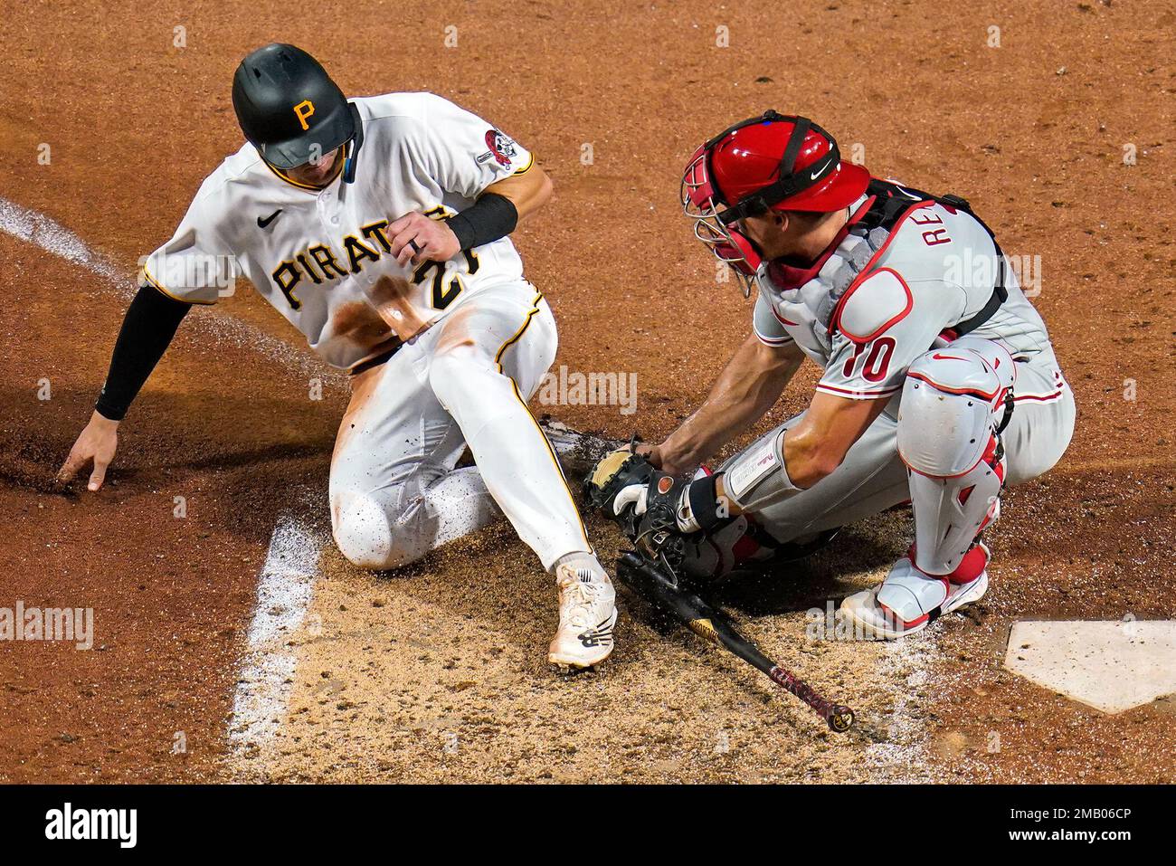 Pittsburgh Pirates' Kevin Newman (27) is tagged out by Philadelphia ...