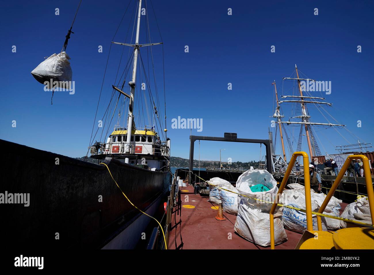 Plastics and other debris from the North Pacific Gyre are unloaded from ...