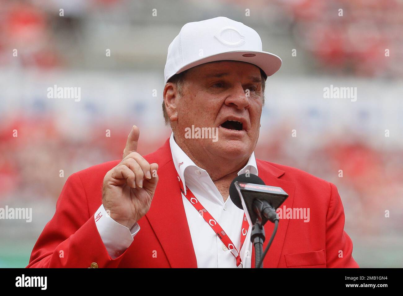 FILE - Pete Rose speaks during a statue-dedication ceremony before a ...
