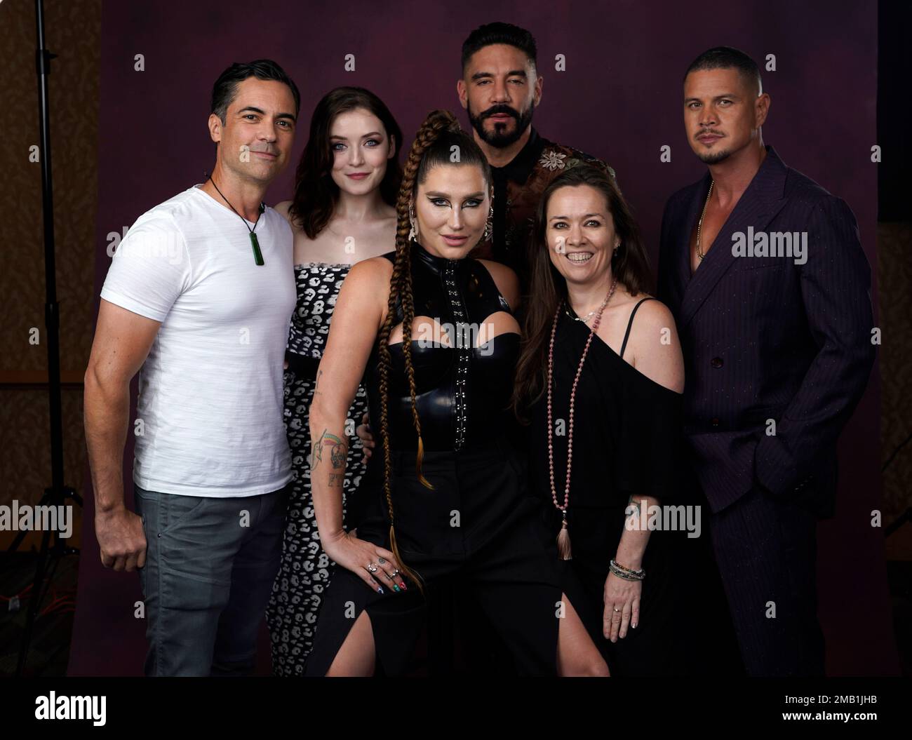 Kesha, front row left, poses for a portrait with the cast of "Mayans M ...