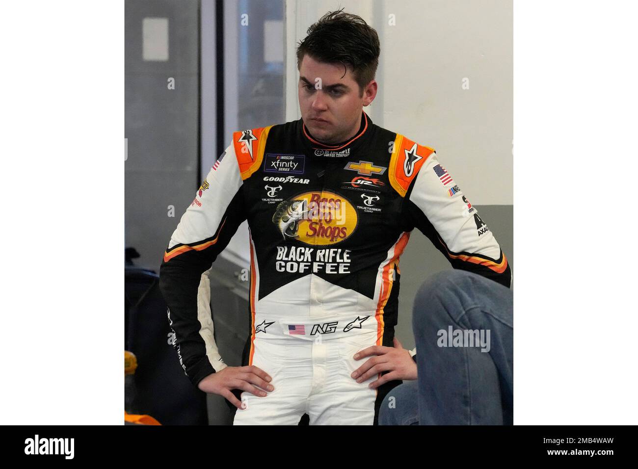 FILE - Noah Gragson watches as the crew works on his car during NASCAR ...