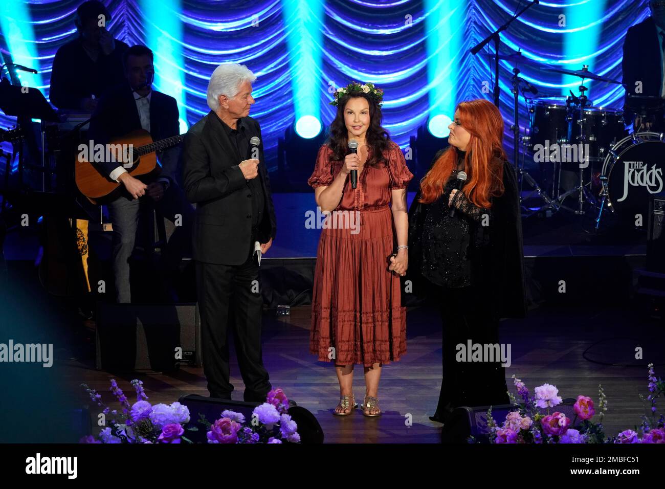 Larry Strickland, Naomi Judd's husband, left; Ashley Judd, center; and ...