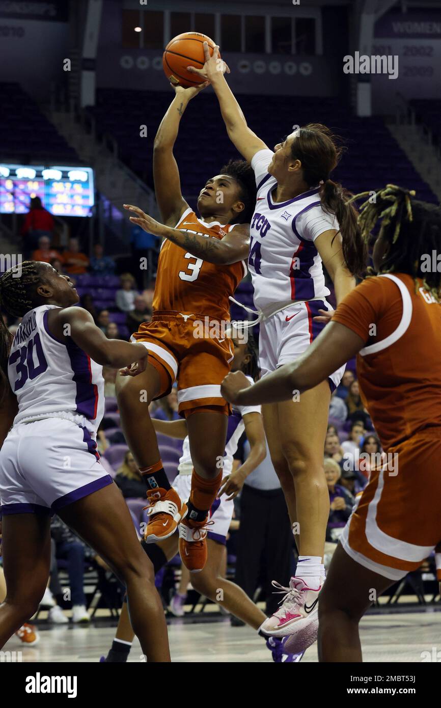 Texas guard Rori Harmon (3) gets her shot blocked by TCU forward Bella ...