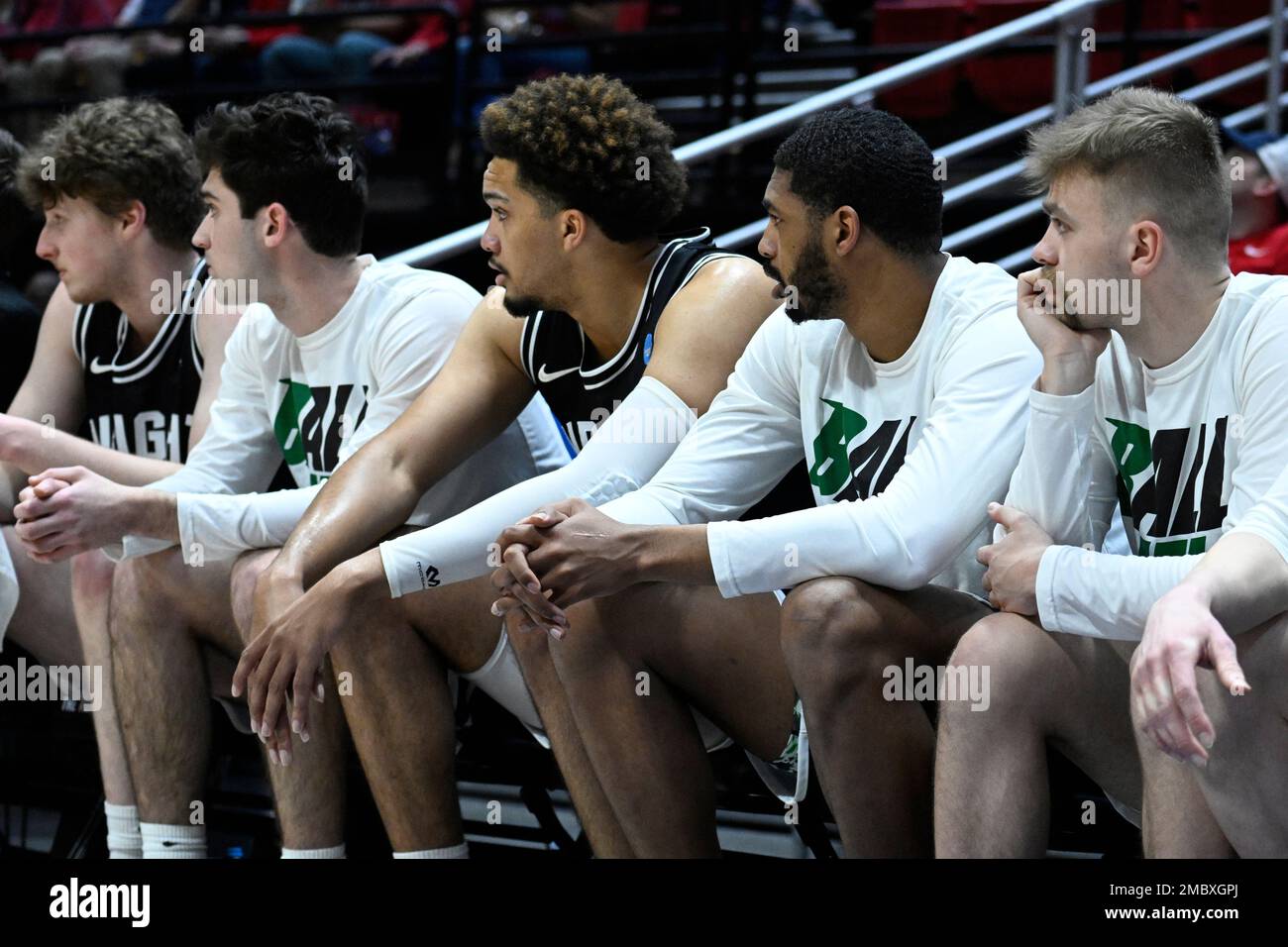 Wright State players sit on the bench during the first half of a first ...