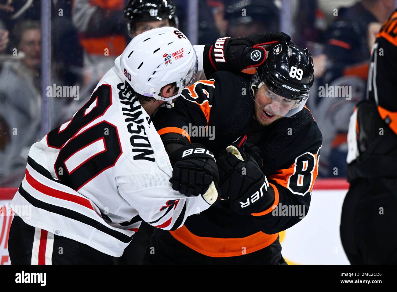 Philadelphia Flyers' Cam Atkinson, right, scuffles with Chicago ...