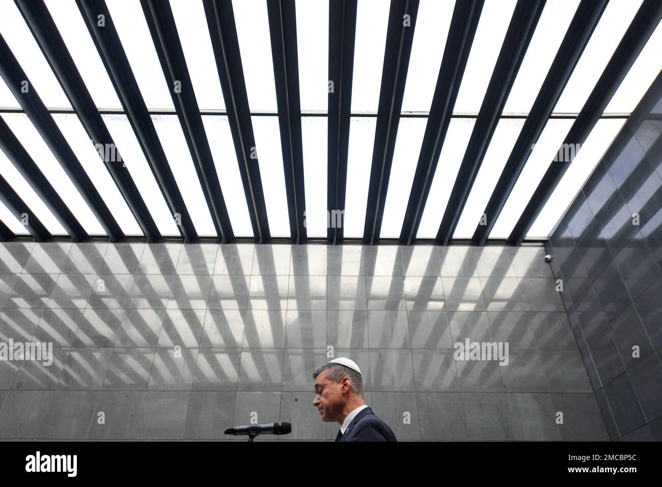 Israel's ambassador to Romania David Saranga delivers a speech during a ...
