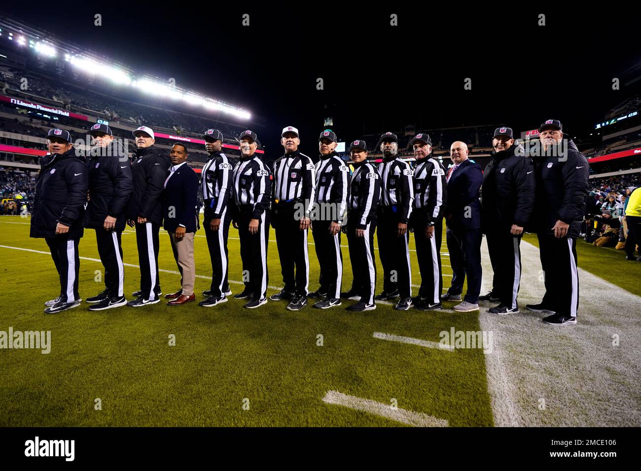 NFL officiating crew, including side judge Eugene Hall (103), umpire ...
