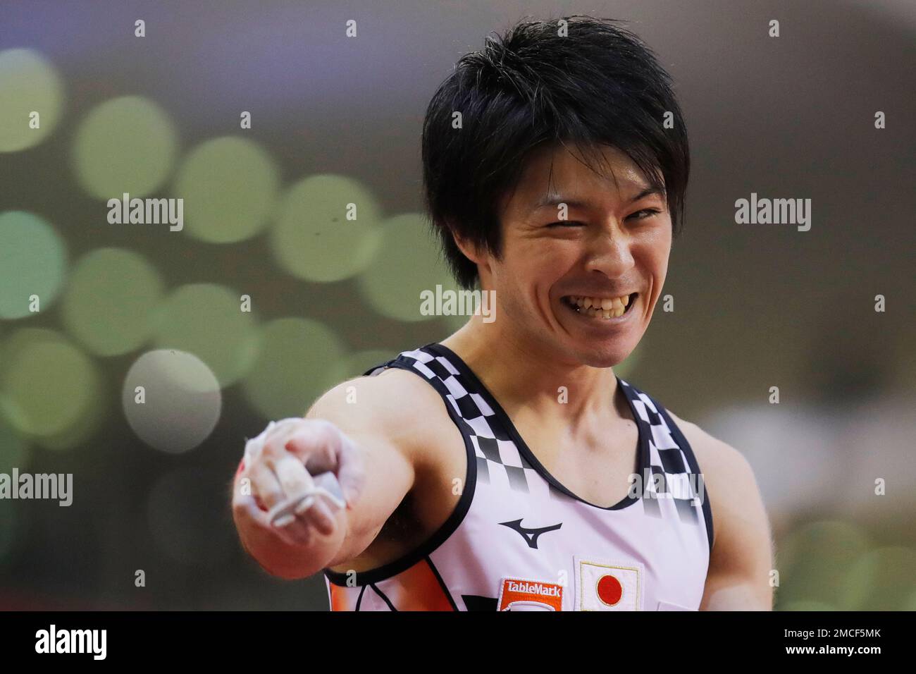 FILE - Silver medalist Kohei Uchimura of Japan celebrates after his ...