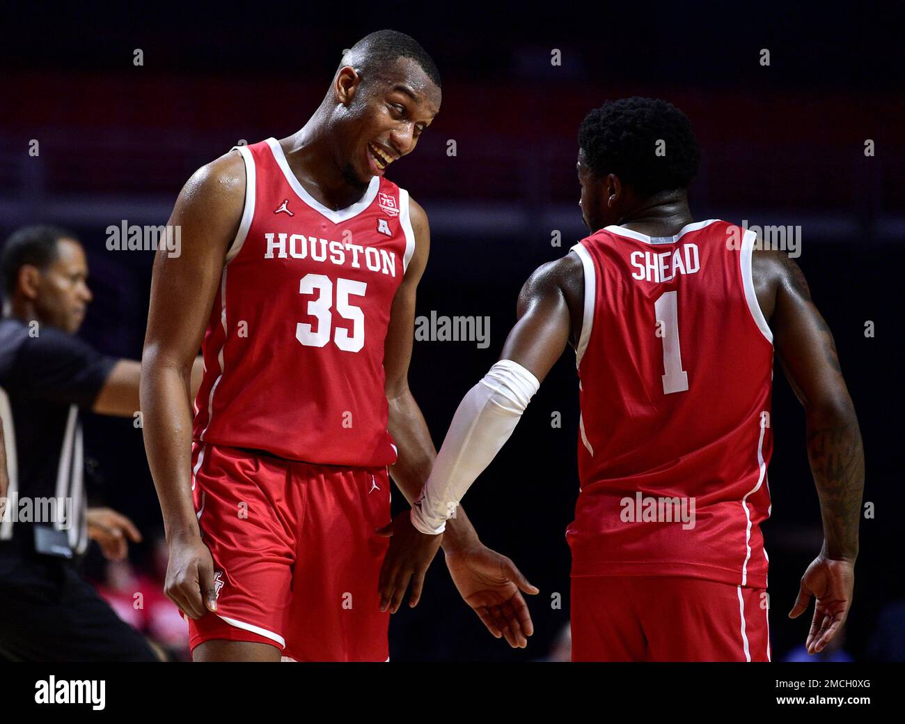 Houston's Fabian White Jr., left, and Jamal Shead react to a call ...