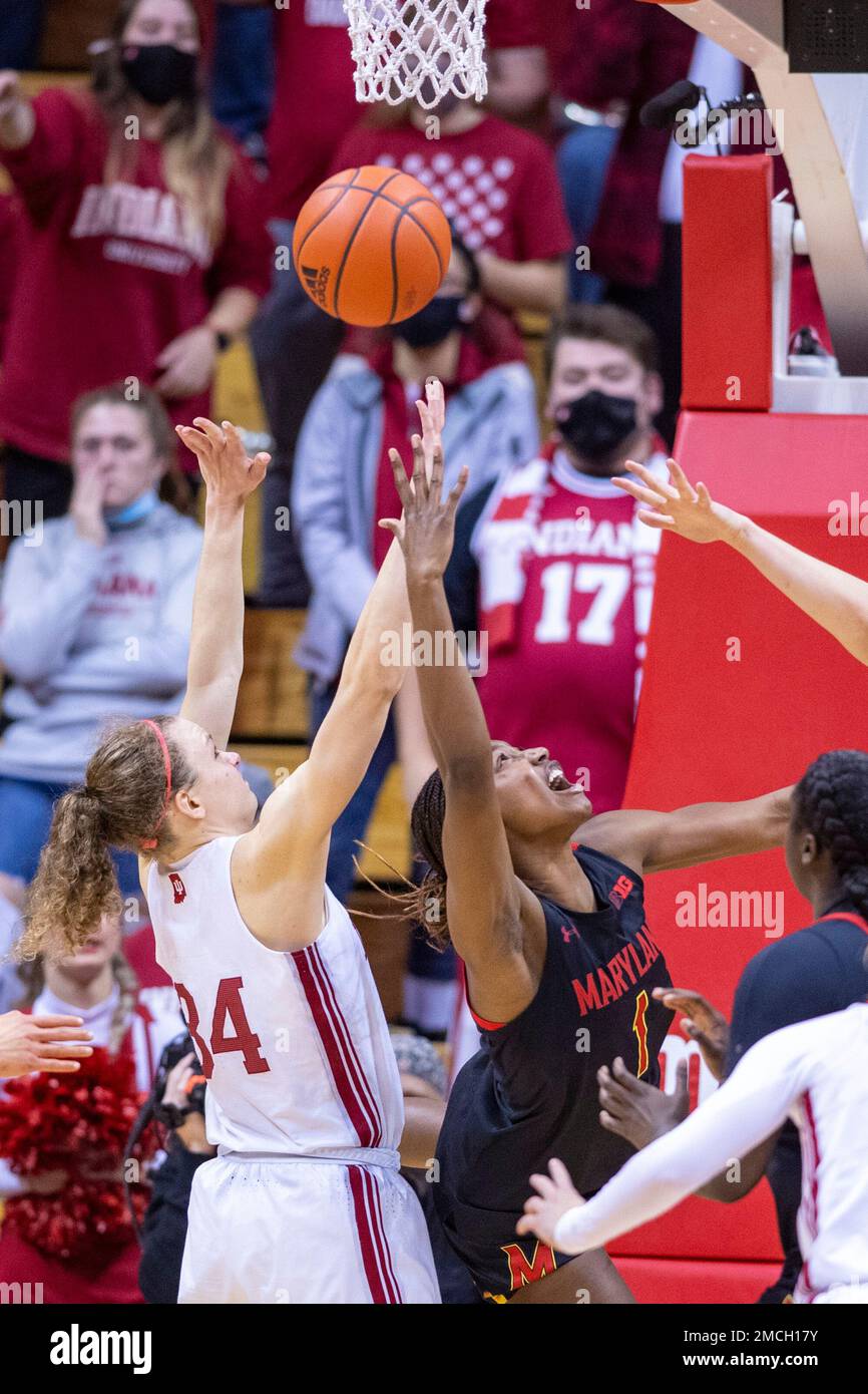 Maryland guard Diamond Miller (1) tries to get a shot away as she's ...