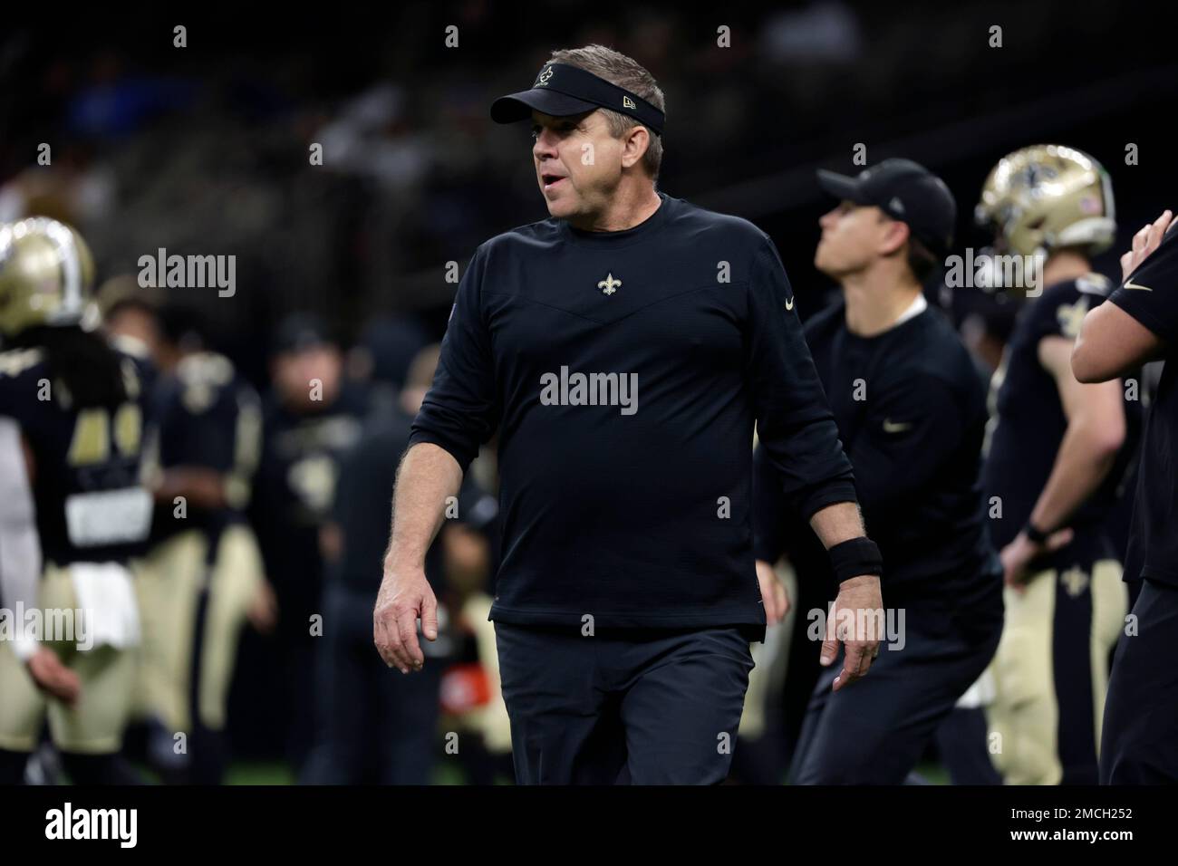 New Orleans Saints head coach Sean Payton walk on the field before an ...