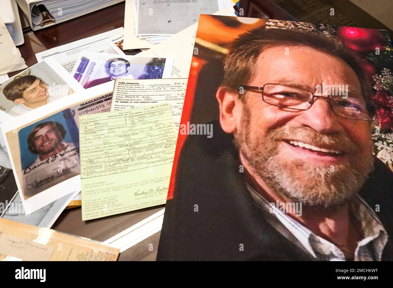 Photos, a driver's license, the original warrant and other items from a ...