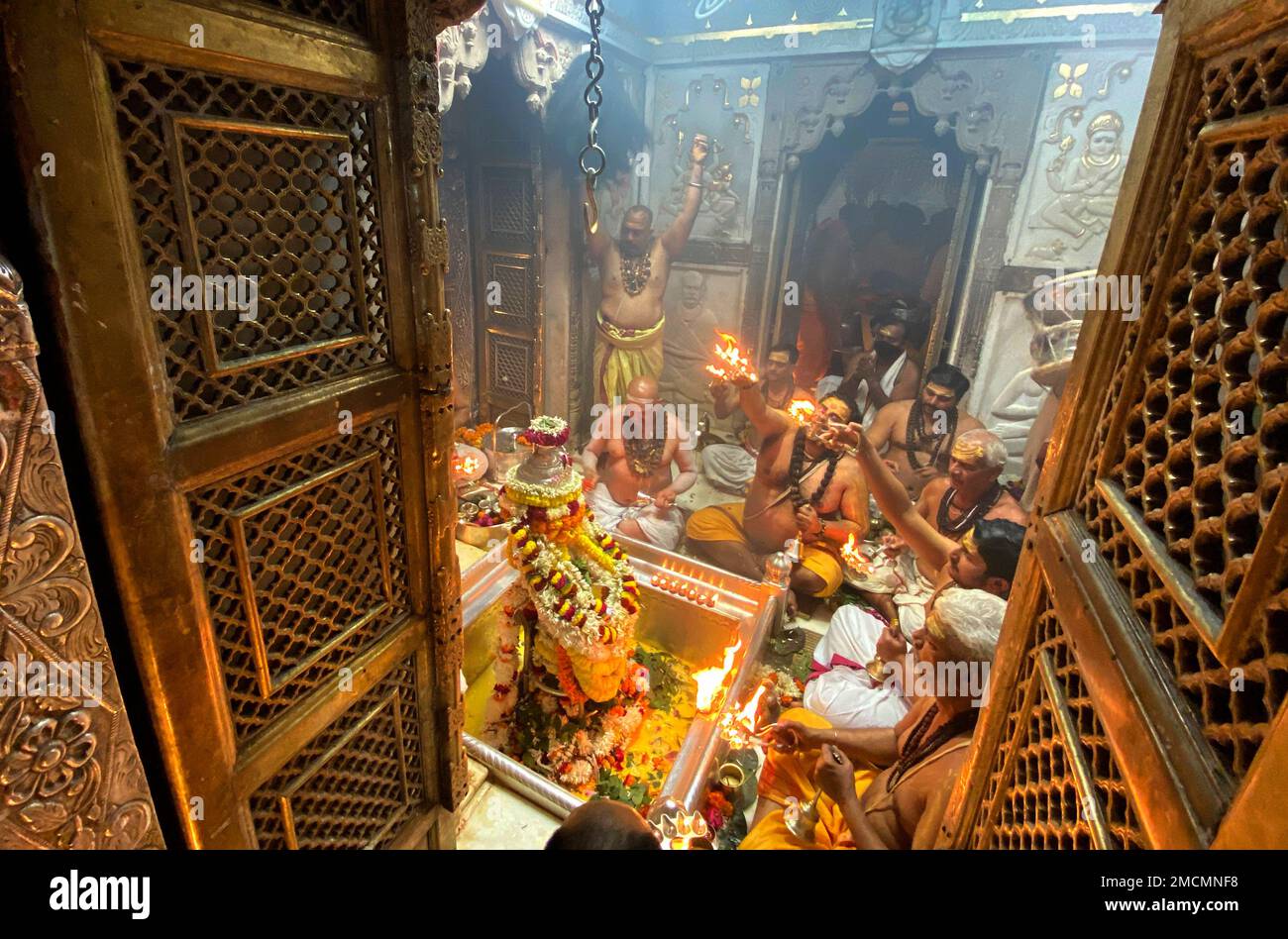 Hindu priets pray at the Kashi Vishwanath temple dedicated to Lord ...