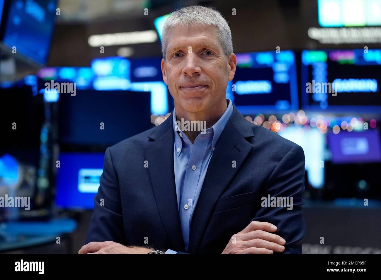 Garmin President & CEO Cliff Pemble poses for photos on the floor of ...