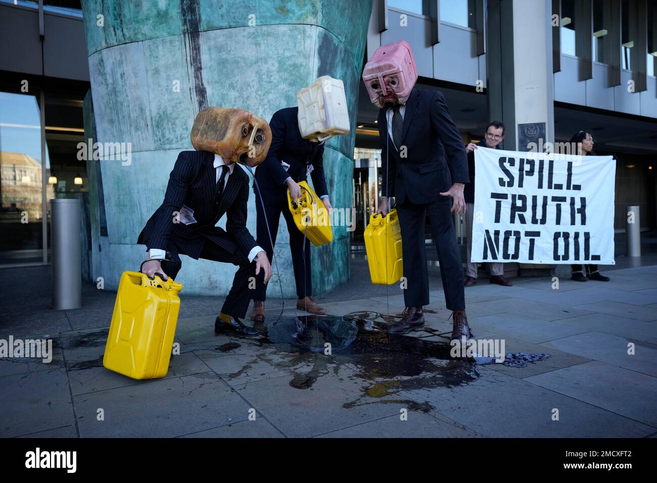Activists from the environment group Ocean Rebellion perform a protest ...