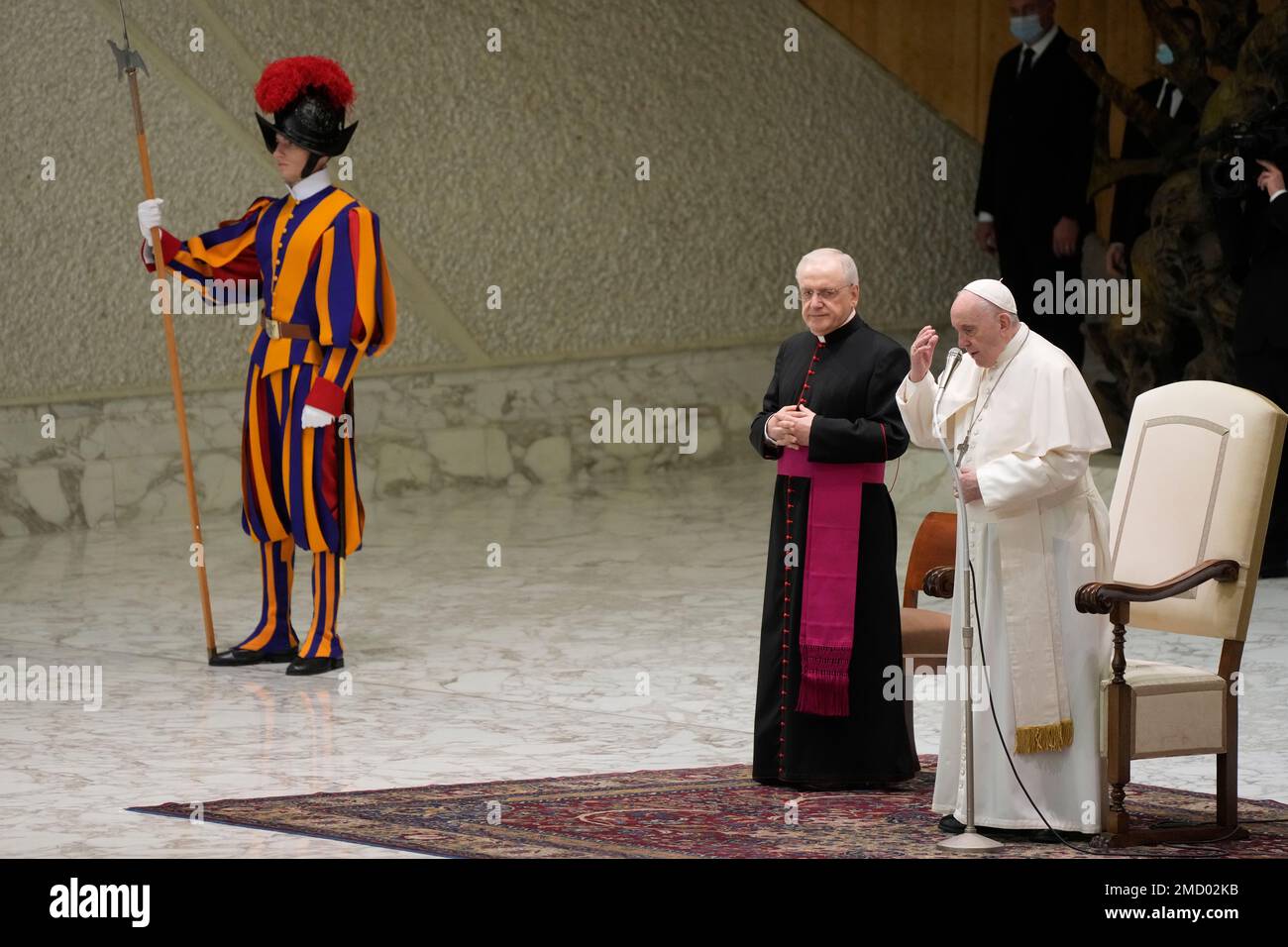 Pope Francis makes the sign of the cross as he arrives to attend his ...