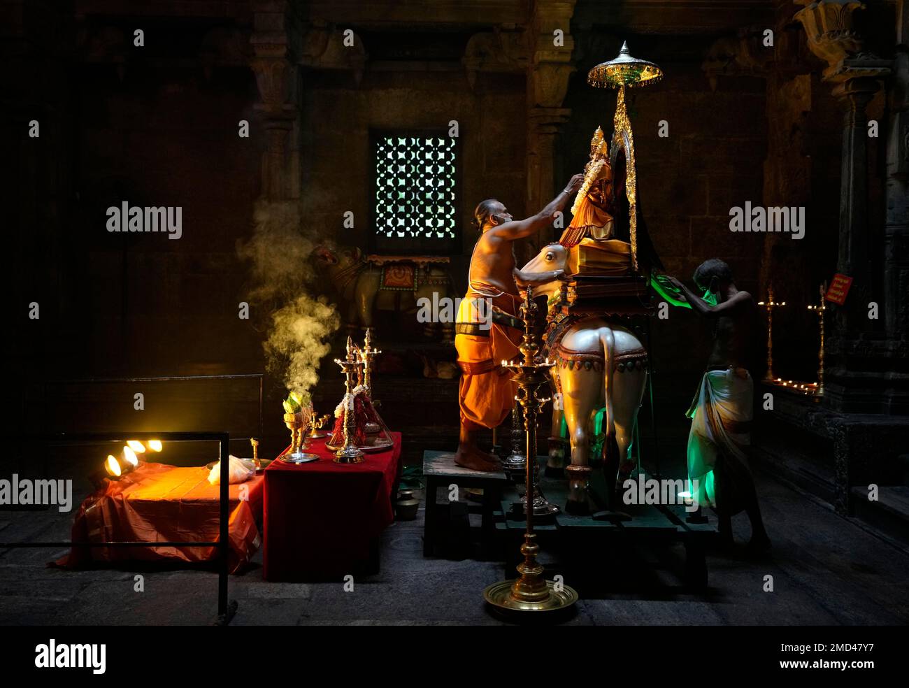Ethnic Tamils decorate an idol of a deity during Diwali, the Hindu festival of lights, in ...