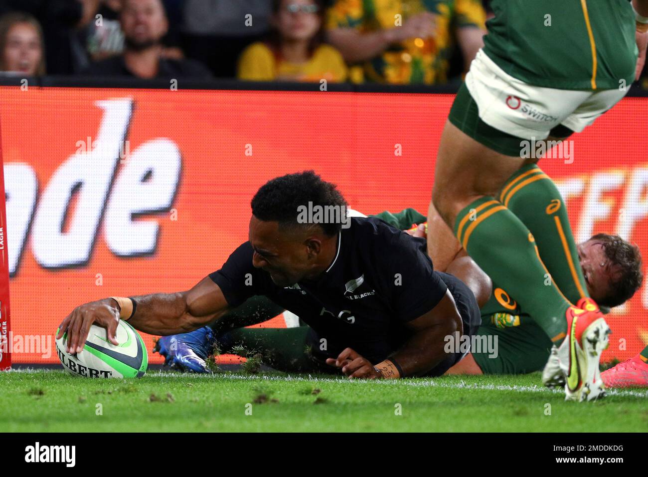 New Zealand's Sevu Reece, left, scores a try as South Africa's Duane ...