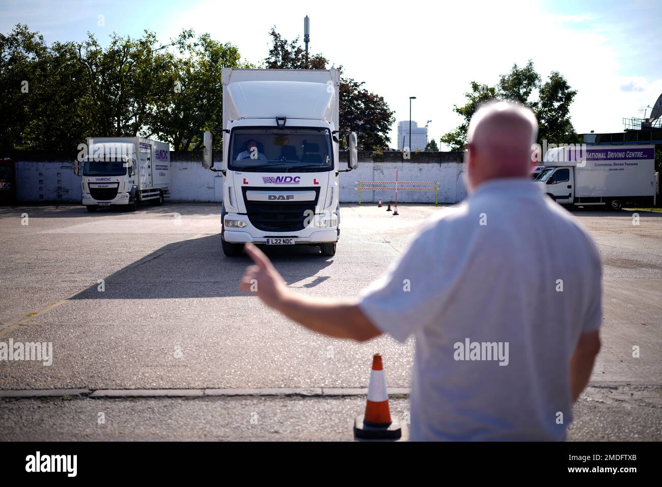 Instructor Graham Bolger directs learner truck driver Cadhene Lubin ...