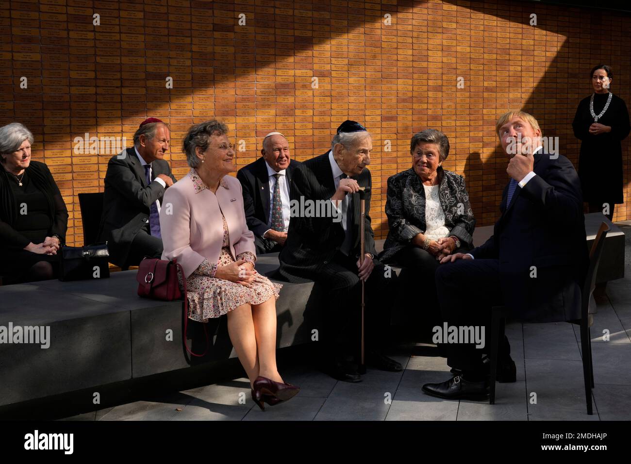 King Willem-Alexander, second right, talks to survivors and relatives ...