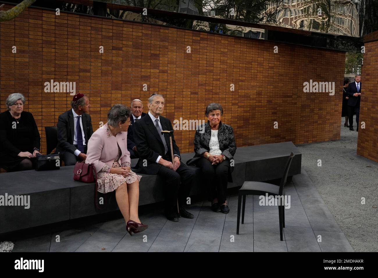 Holocaust survivors and relatives of victims wait to talk to King ...