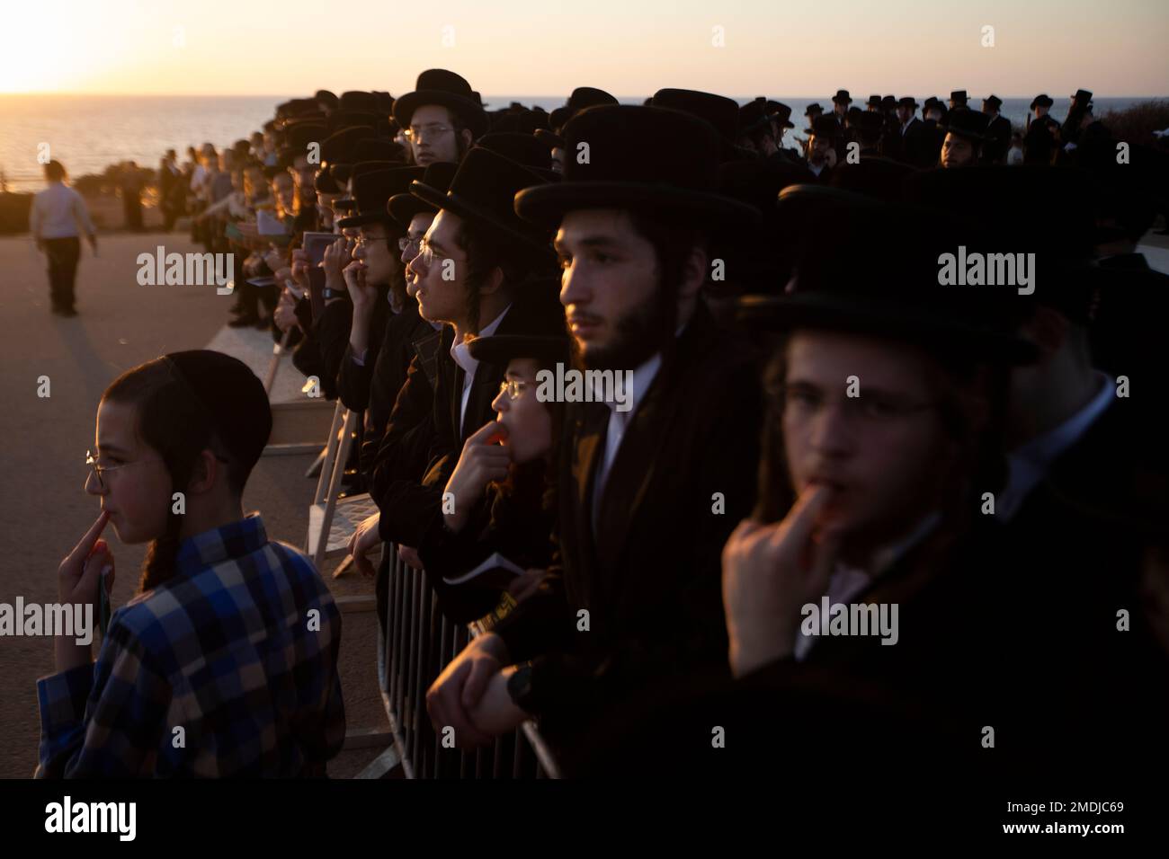 Ultra-Orthodox Jews of the Kiryat Sanz Hassidic sect listen to their ...