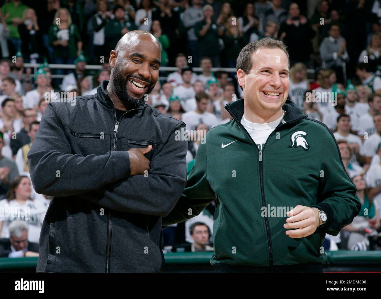 FILE - In this Dec. 12, 2015 file photo, former Michigan State players ...