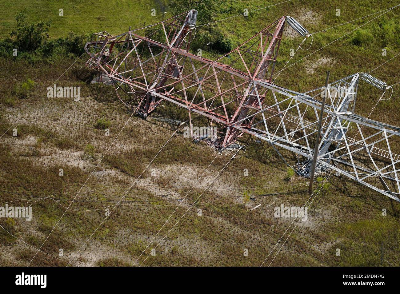 A twisted tower that carried crucial electrical feeder lines to the New ...