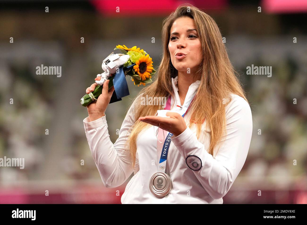 Silver medalist Maria Andrejczyk, of Poland, poses on the podium during ...