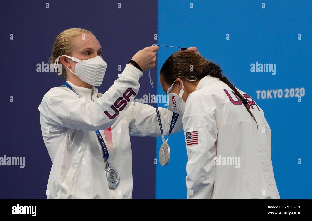 Jessica Parratto and Delaney Schnell of the United States' receives the ...