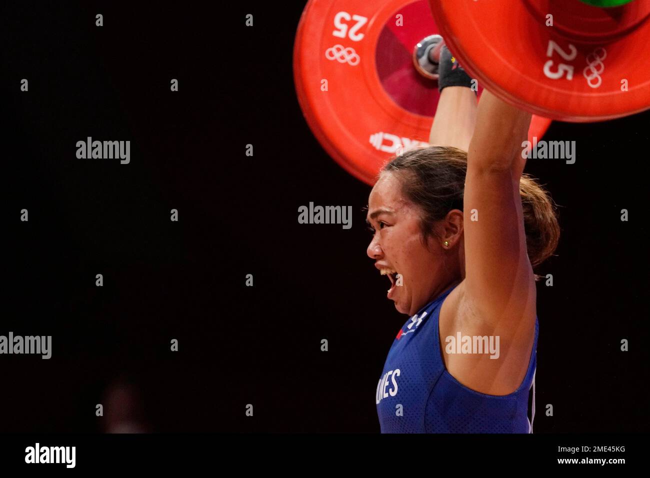 Hidilyn Diaz of Philippines celebrates as she competes and sets new ...
