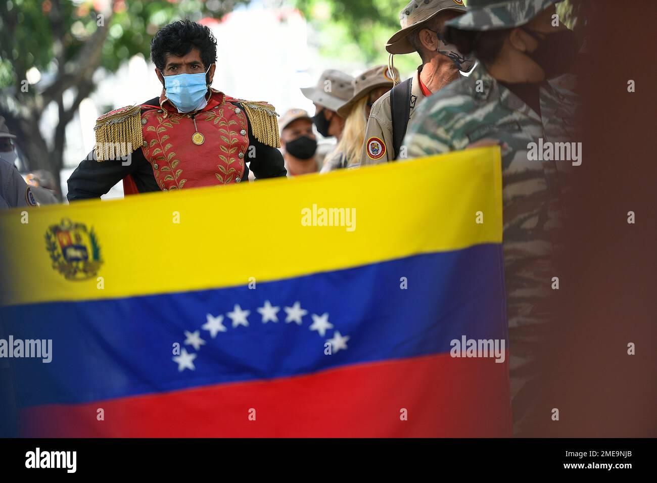 A man dressed as Venezuelan independence hero Simon Bolivar attends a ...