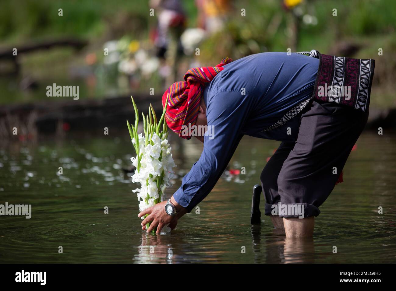 As part of the Prayer for Rain ceremony, an Ajq'ij or spiritual guide ...