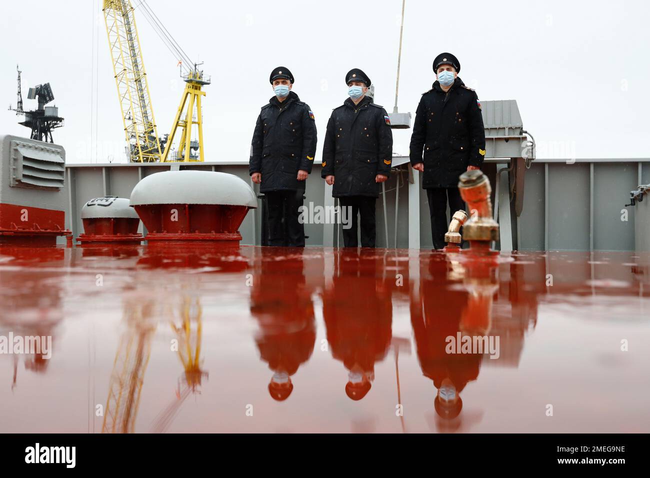 Russian sailors stand guard on board of the Northern Fleet's flagship ...