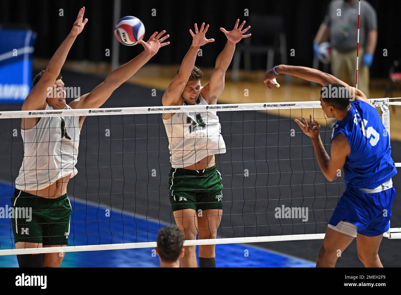 Hawaii's Patrick Gasman, left, and Colton Cowell attempt to block a ...