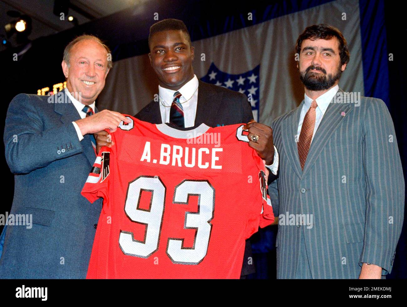 FILE - In this April 24, 1988, file photo, Aundray Bruce, center, holds ...