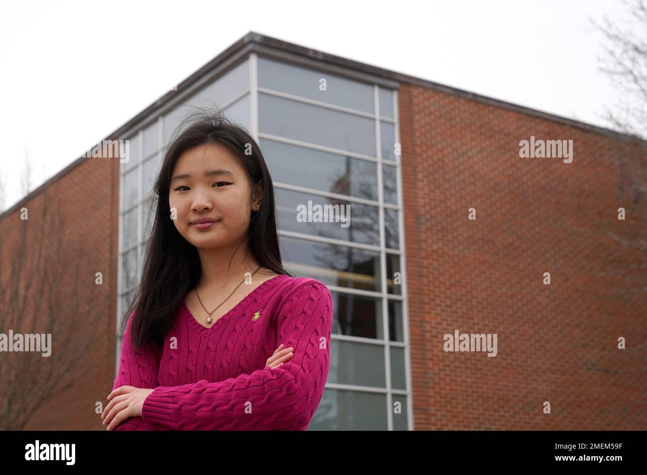 High school student Grace Hu, 16, of Sharon, Mass., stands for a ...