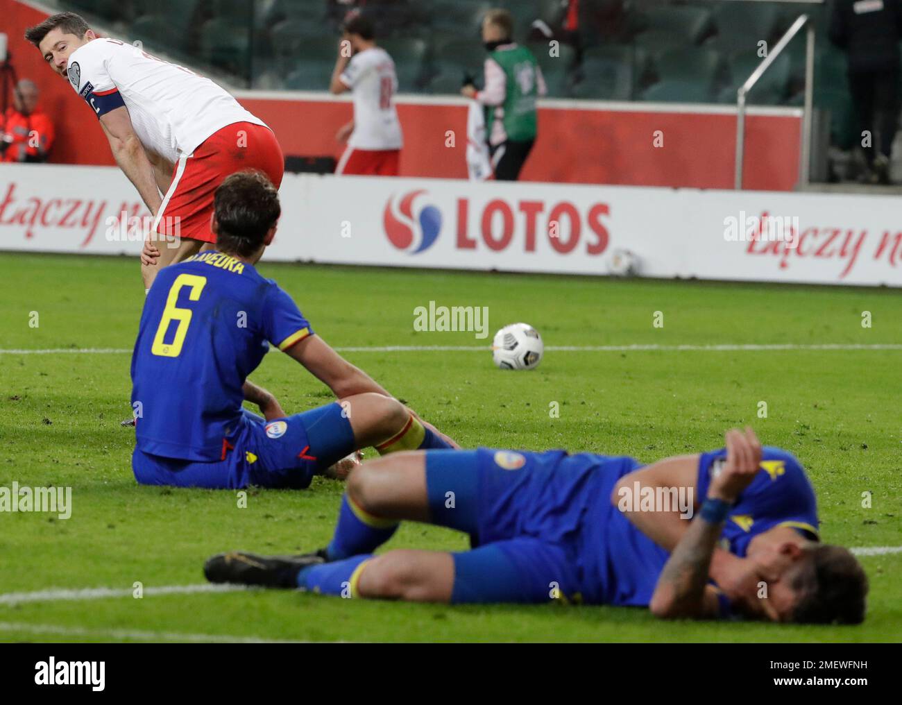 Poland's forward Robert Lewandowski ,center, after action with his ...